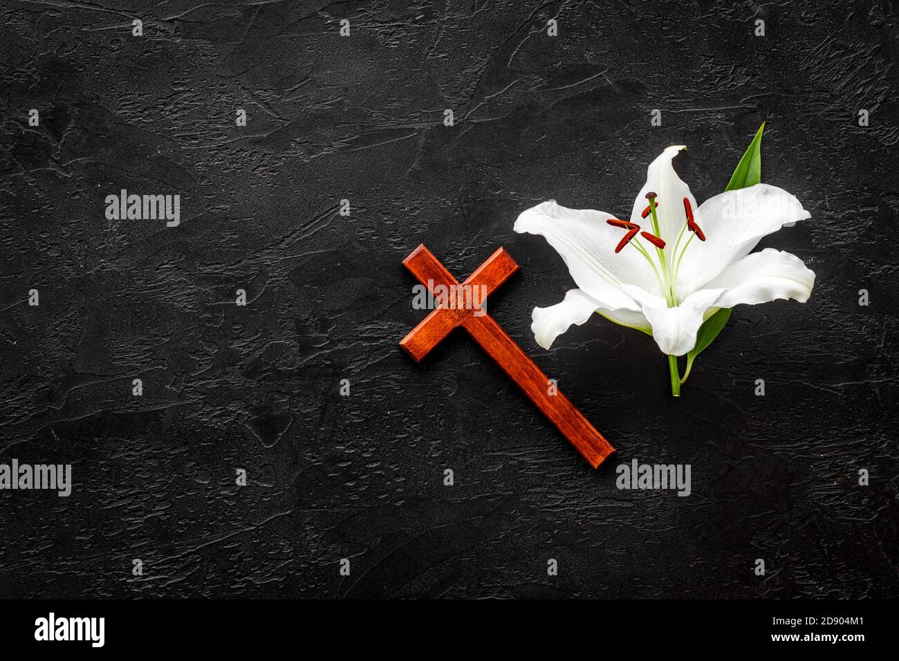 Lily funeral flower with cross. Condolence card with copy space Stock ...
