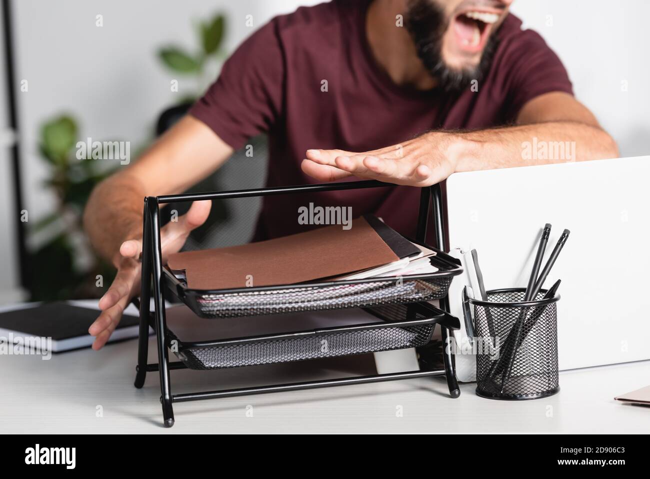 Angry man about to throw laptop hi-res stock photography and images - Alamy