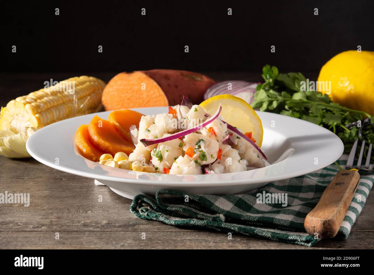 Traditional peruvian ceviche with fish, sweet potato, corn and ...