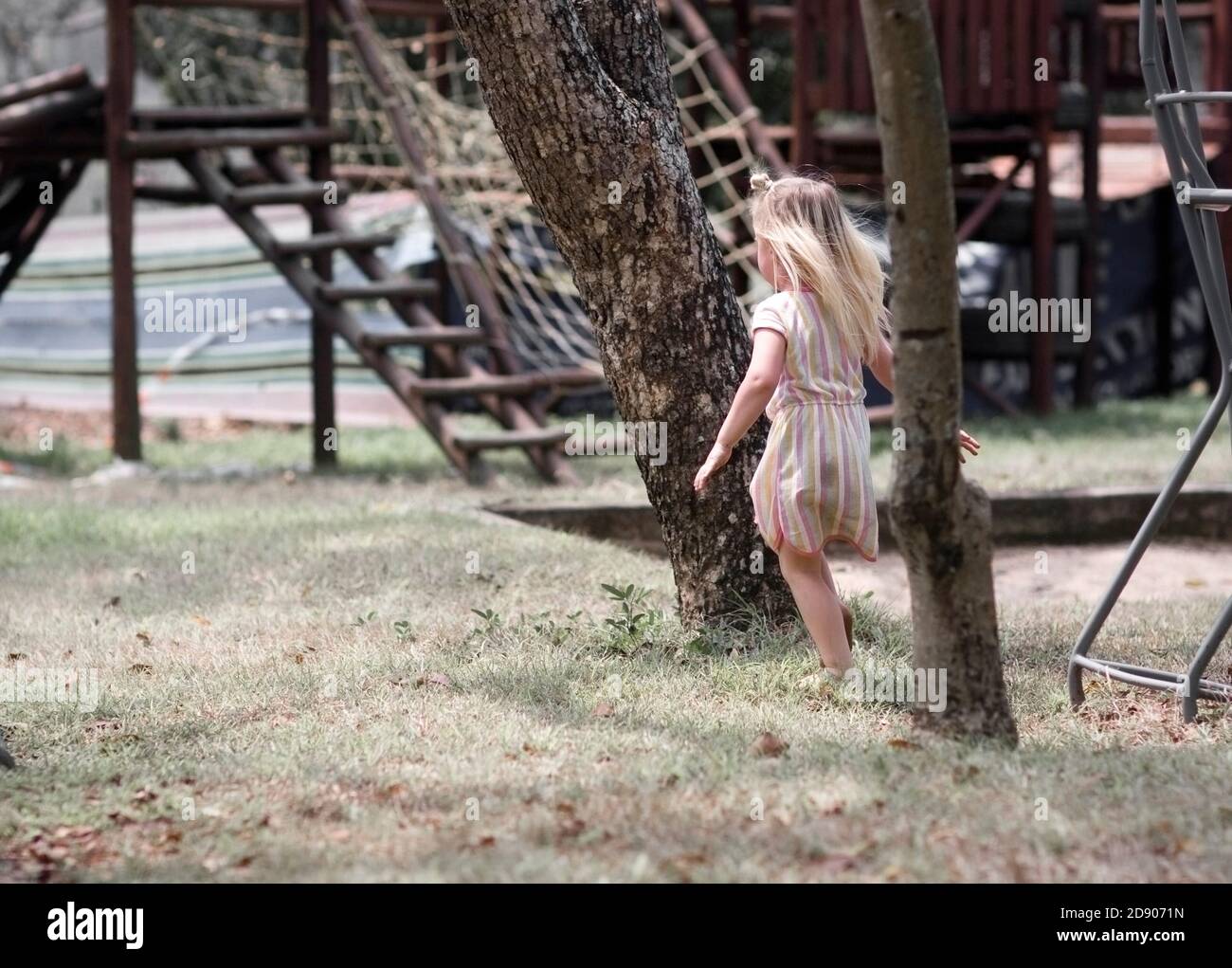 Girl alone in playground hi-res stock photography and images - Alamy