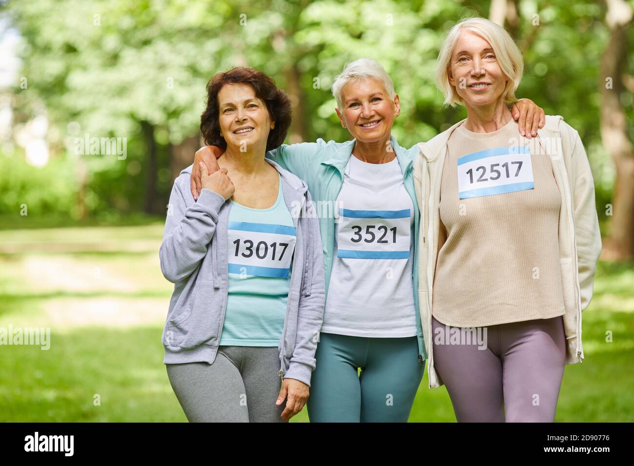 Three Friends Jogging Together High Resolution Stock Photography and ...