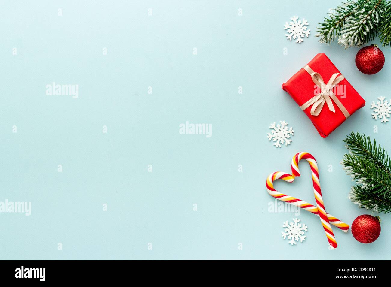 Christmas table layout with gifts and decorations Stock Photo - Alamy