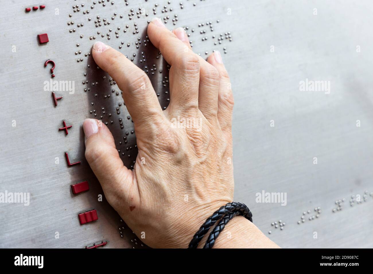 Finger reading braille tactile on public park message board Stock Photo ...
