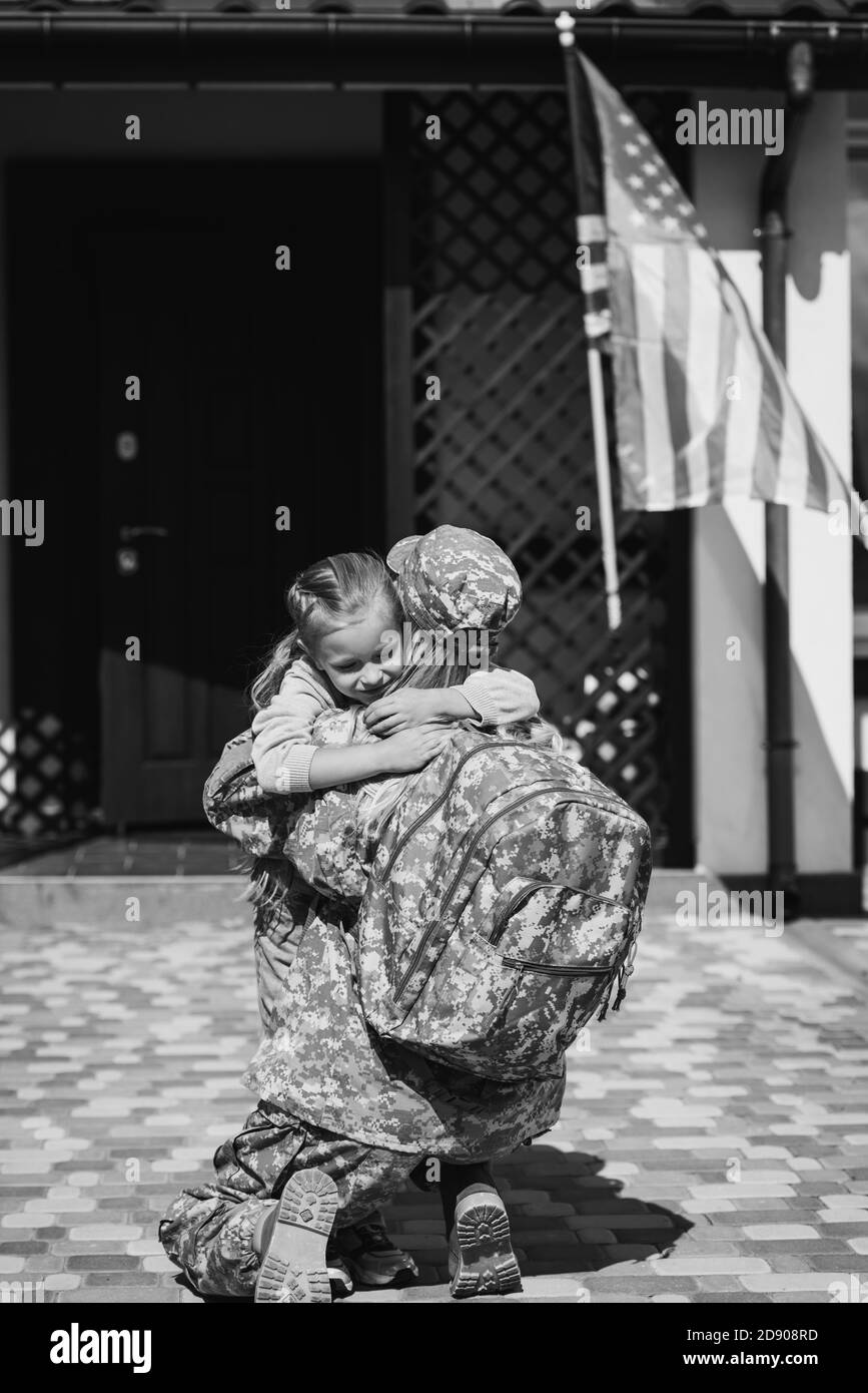 Hugging knee Black and White Stock Photos & Images - Alamy