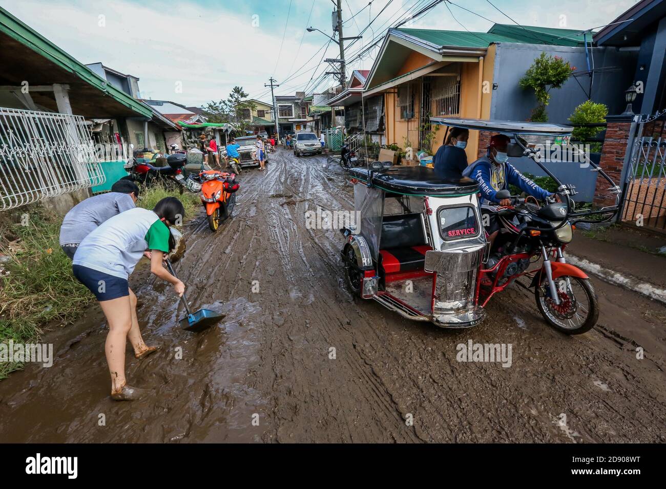 Batangas Province, Philippines. 2nd Nov, 2020. Residents clean a road ...