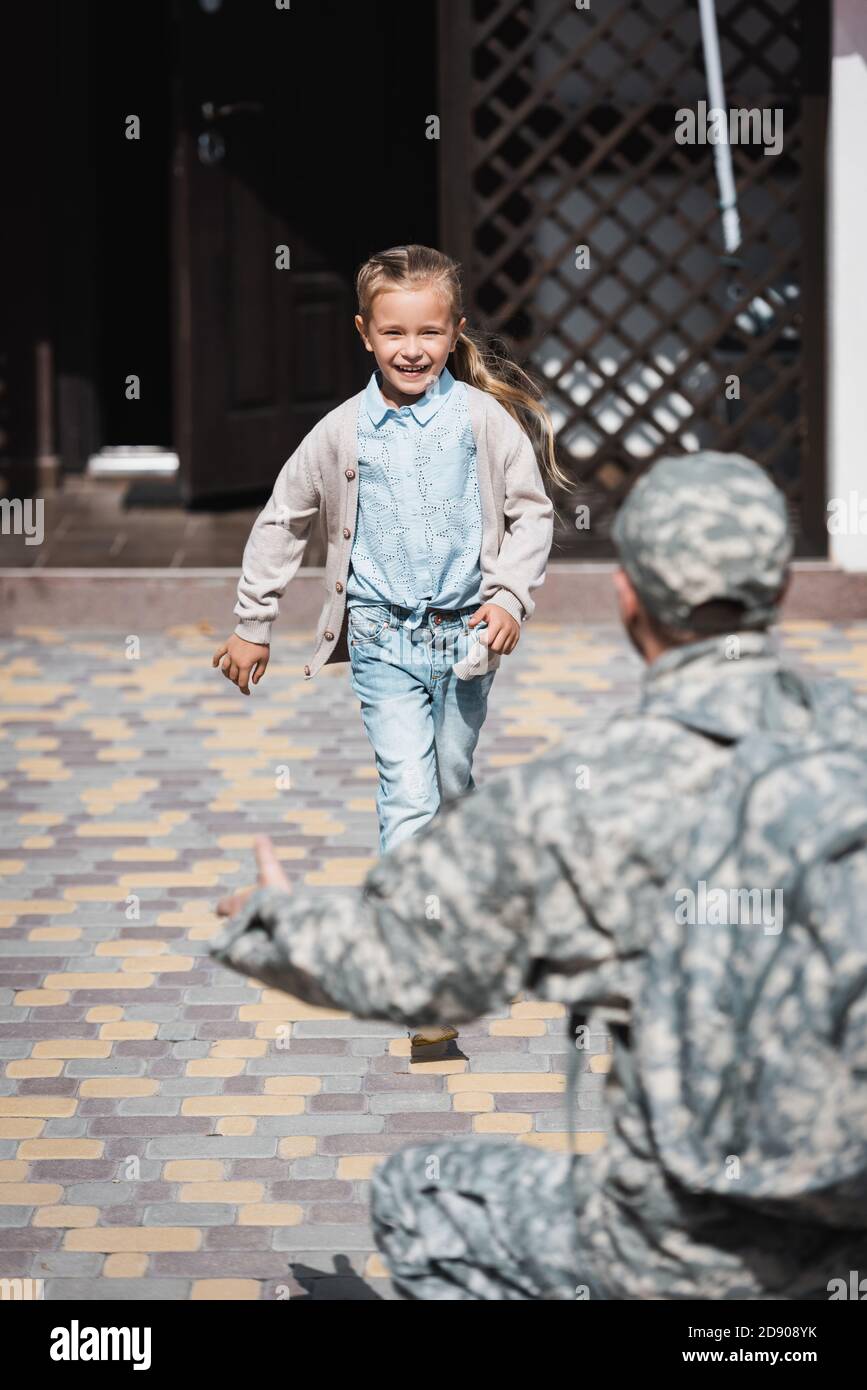 Military man running hi-res stock photography and images - Alamy