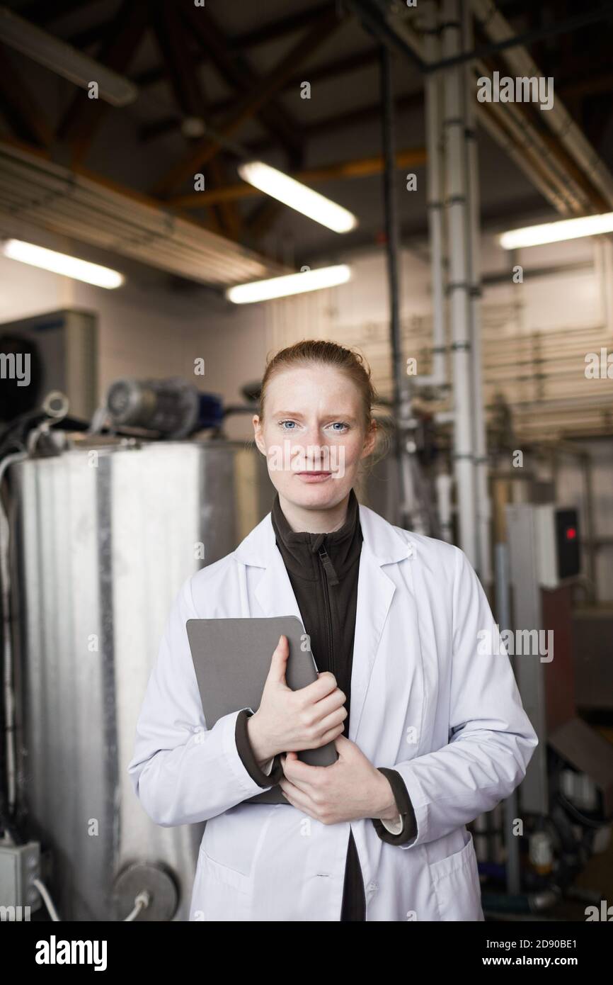 Woman wearing lab coat hi-res stock photography and images - Alamy