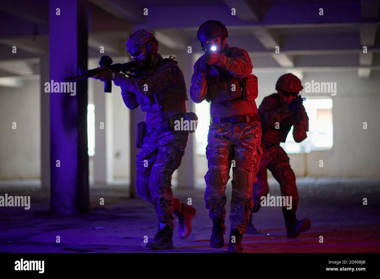 Soldiers squad in tactical formation having action urban environment ...