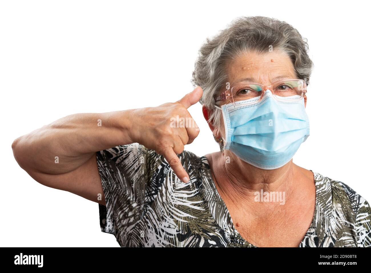 Old female model making phone call gesture with hand near ear wearing ...