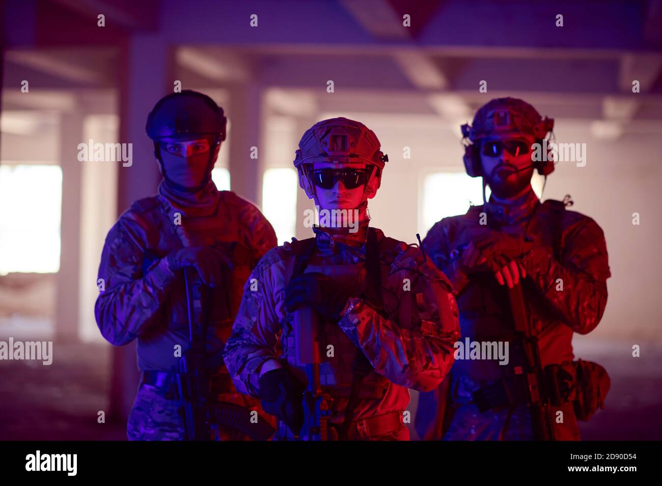 soldier squad team portrait in urban environment colored lightis Stock ...