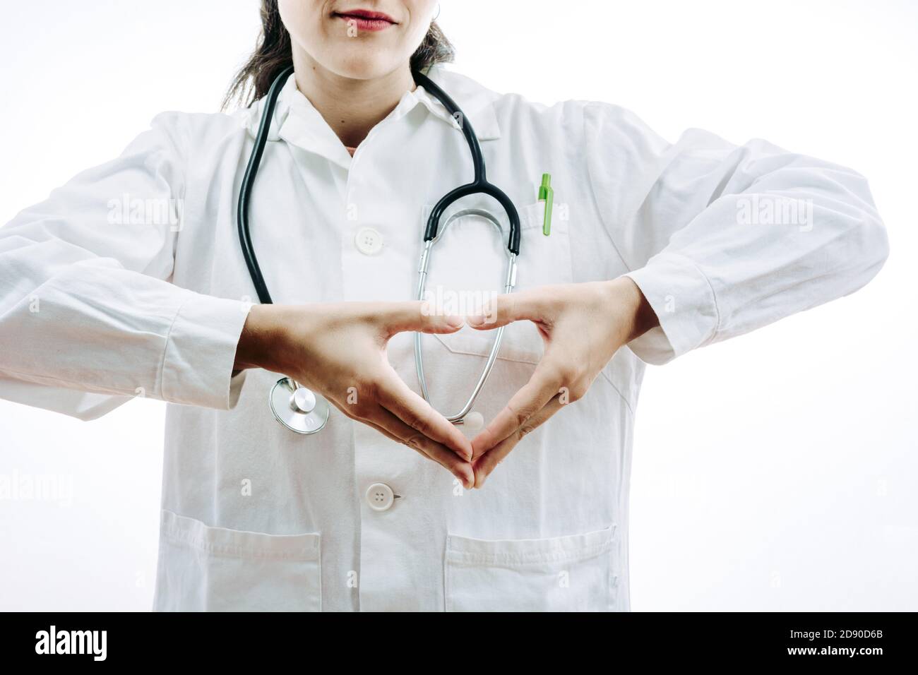 Doctor doing the heart with the hand. She is an expert in cardiac ...