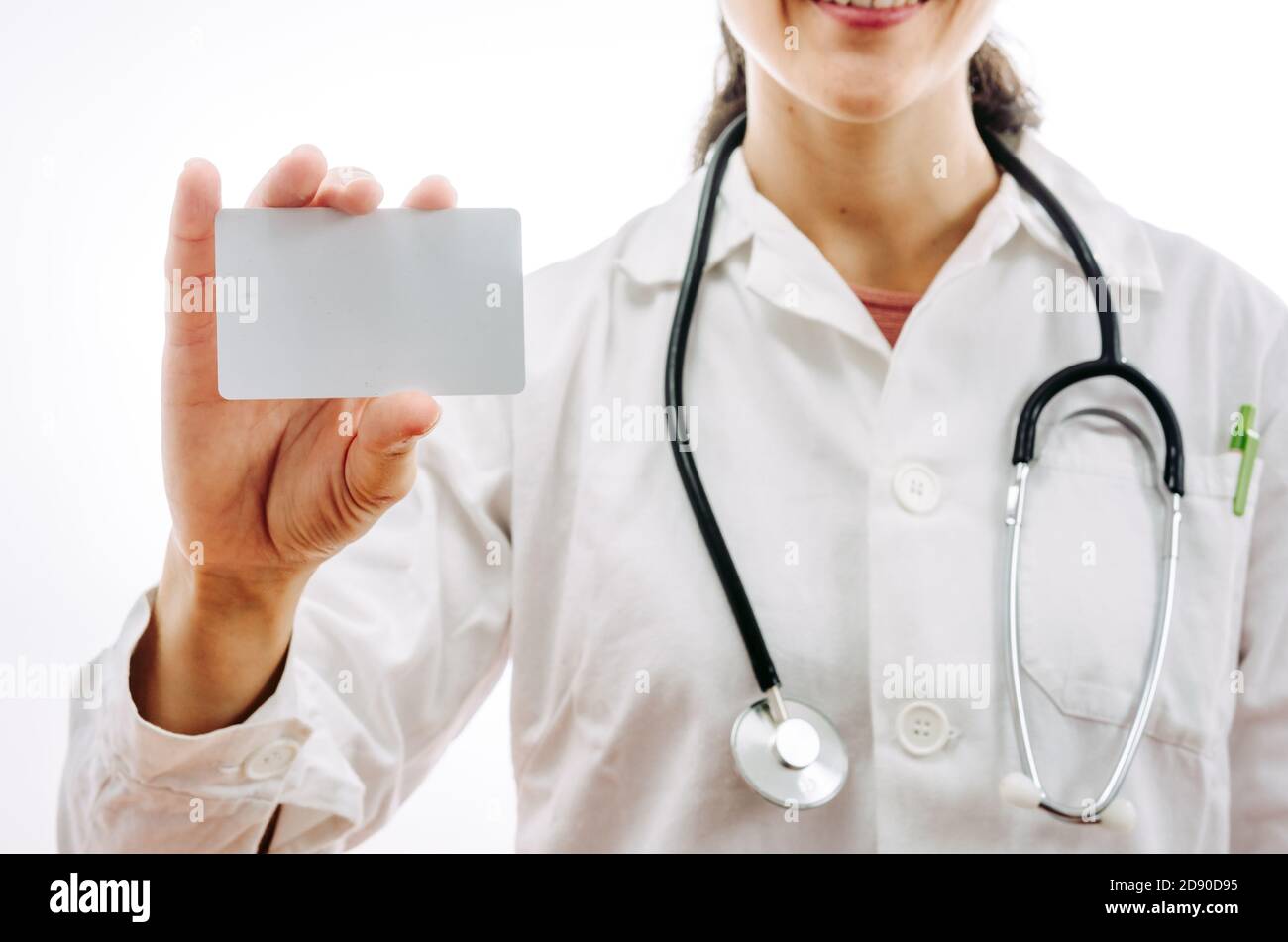 Doctor showing a blank health insurance card. Photo with white ...