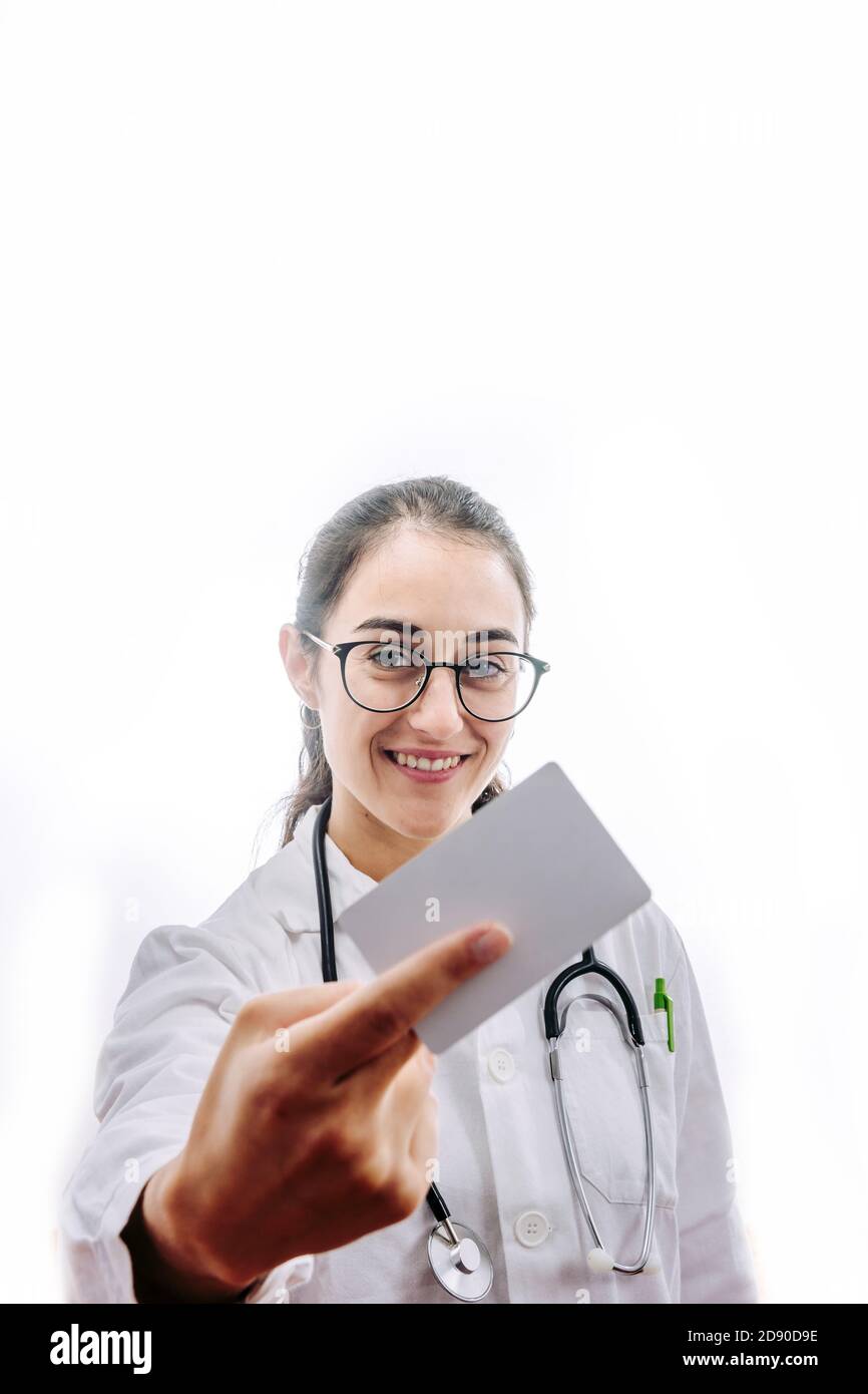 Doctor showing a blank health insurance card. Photo with white ...