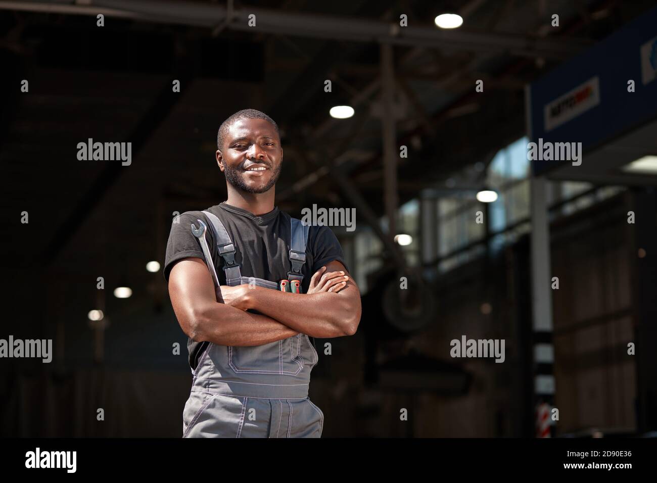 portrait of confident successful auto mechanic man of african ...