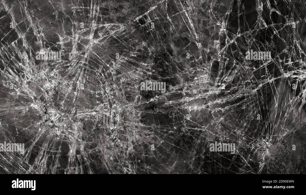 Abstract image of broken glass texture. Close-up broken car windshield ...