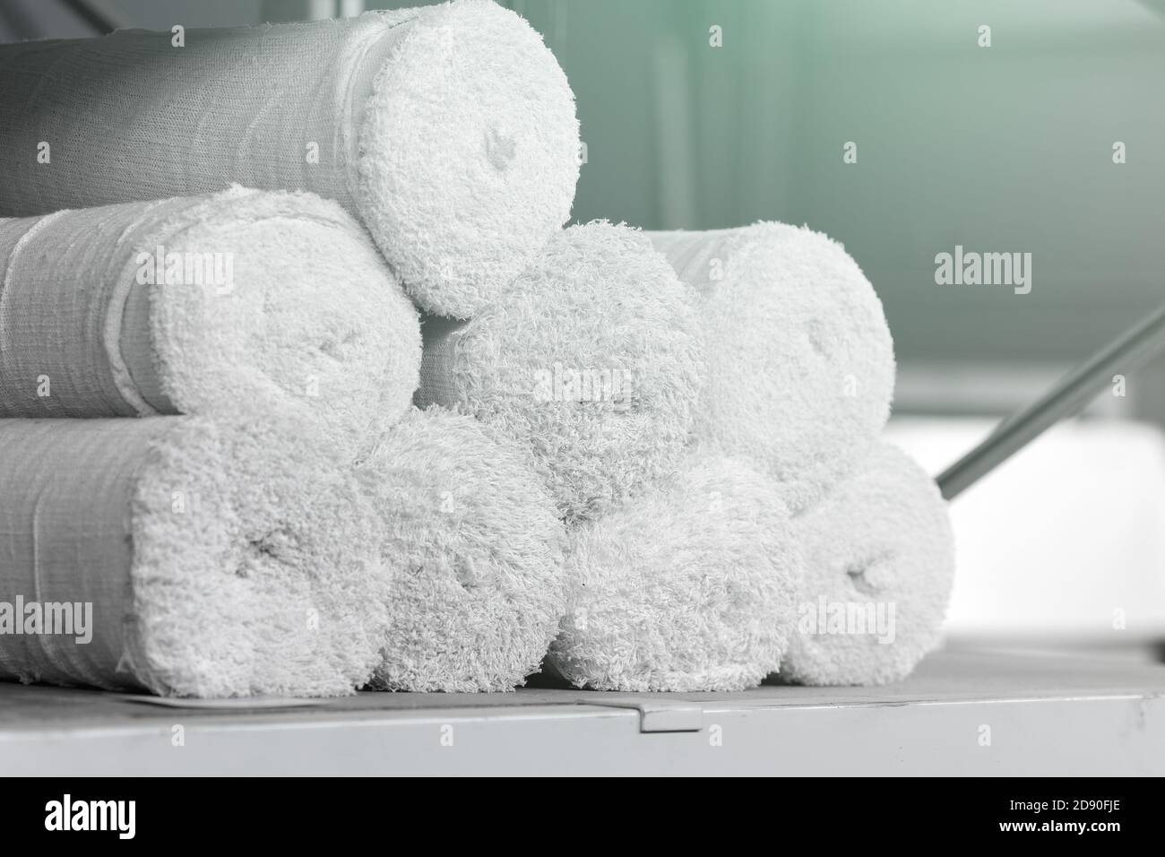 Rolls of factory textiles close-up. Raw material or material for making ...