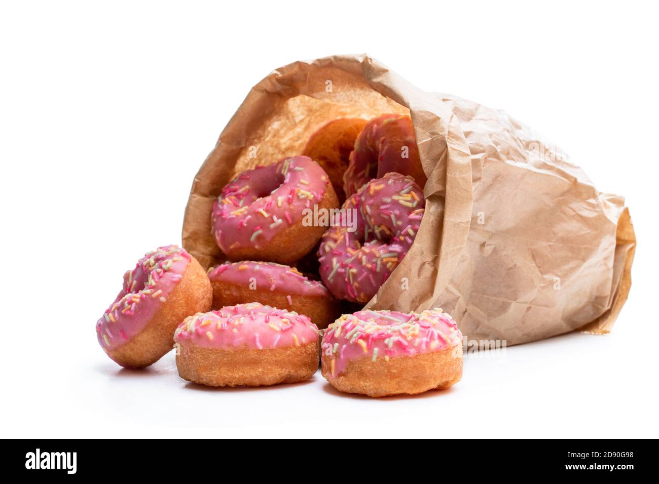 Mini pink glazed doughnuts in paper bag isolated on white Stock Photo ...
