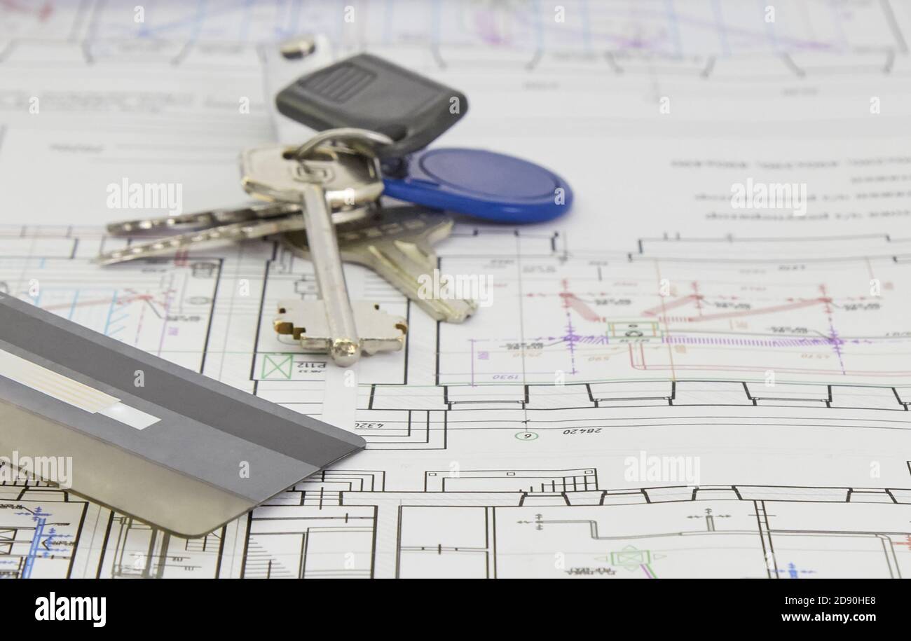 architectural plan of the house on the sheet are the keys and credit ...