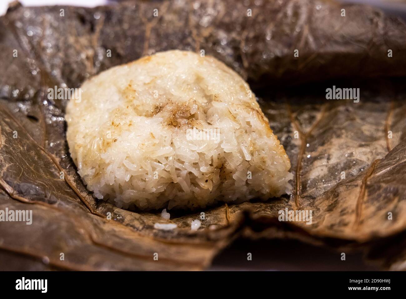 Glutinous rice wrapped with leaf dumpling, popular Chinese dim sum ...
