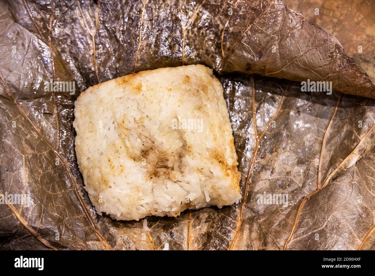 Glutinous rice wrapped with leaf dumpling, popular Chinese dim sum ...