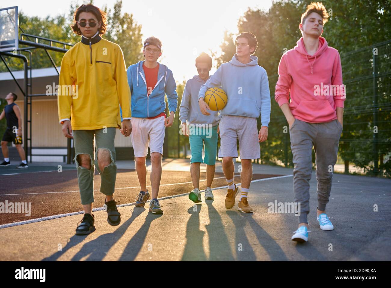 friendly group of caucasian teenagers boys ready to play basketball ...