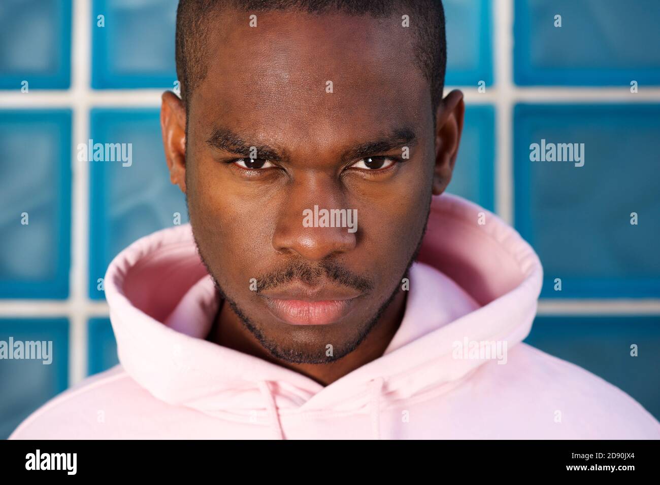 Close up portrait of tough young african american male fashion model ...