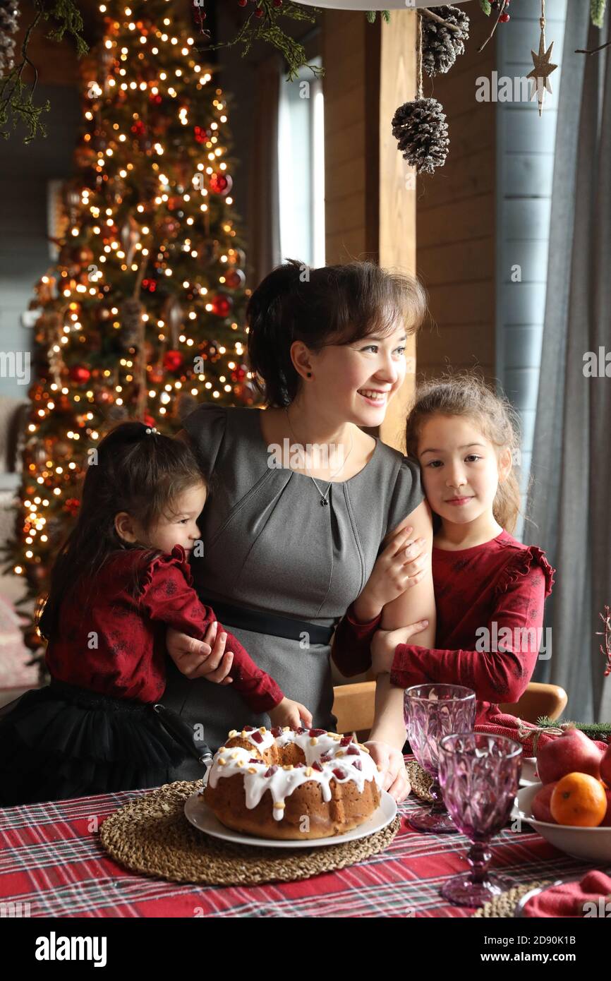 Beautiful happy family two daughters hi-res stock photography and ...