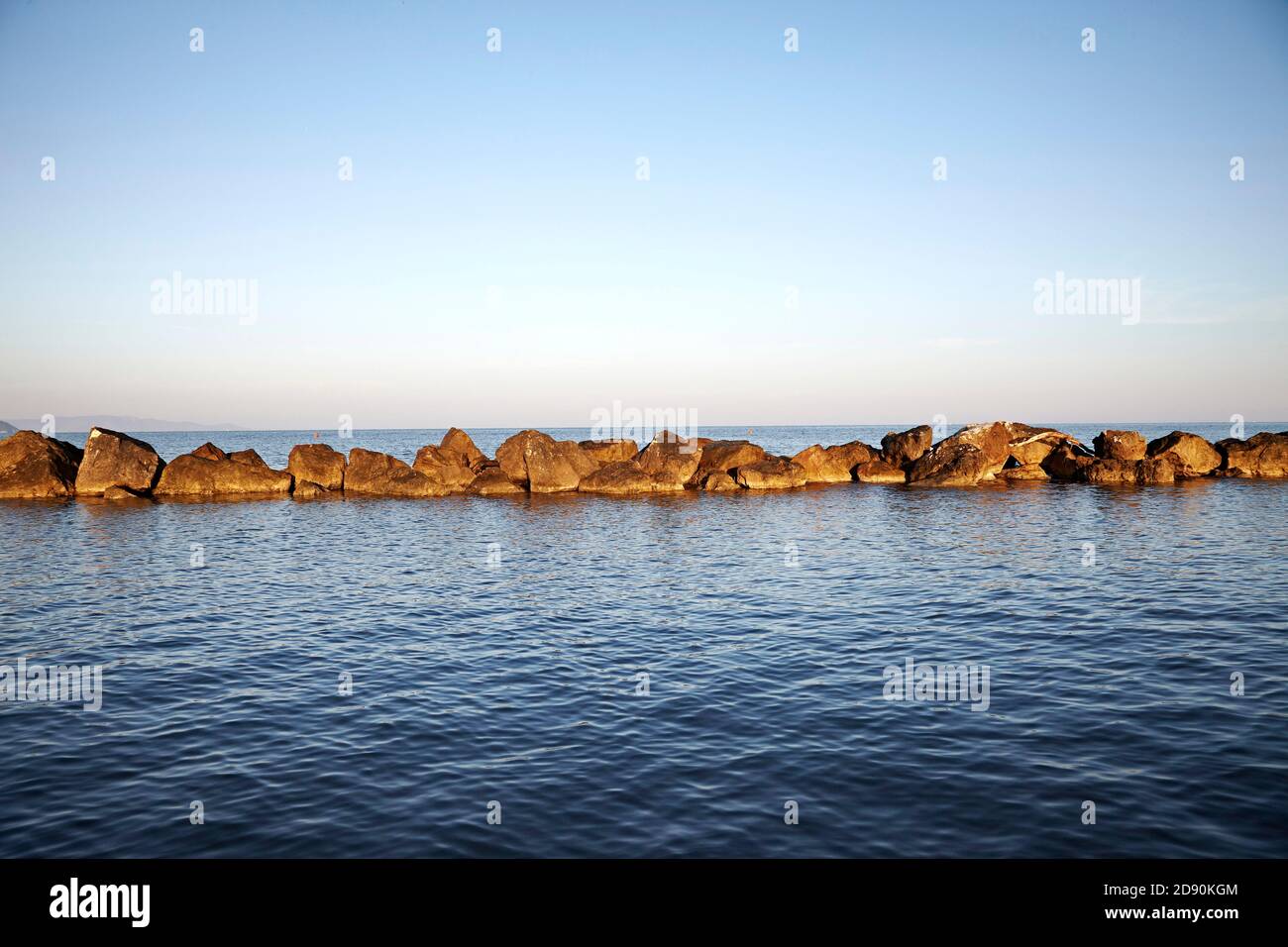 Calm early evening sea hi-res stock photography and images - Alamy