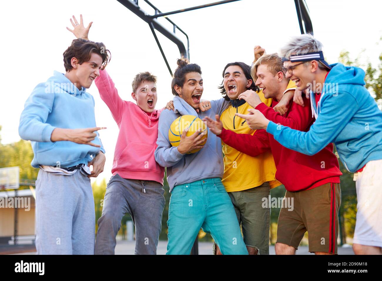 positive happy group of young guys celebrate their winning, caucasian ...