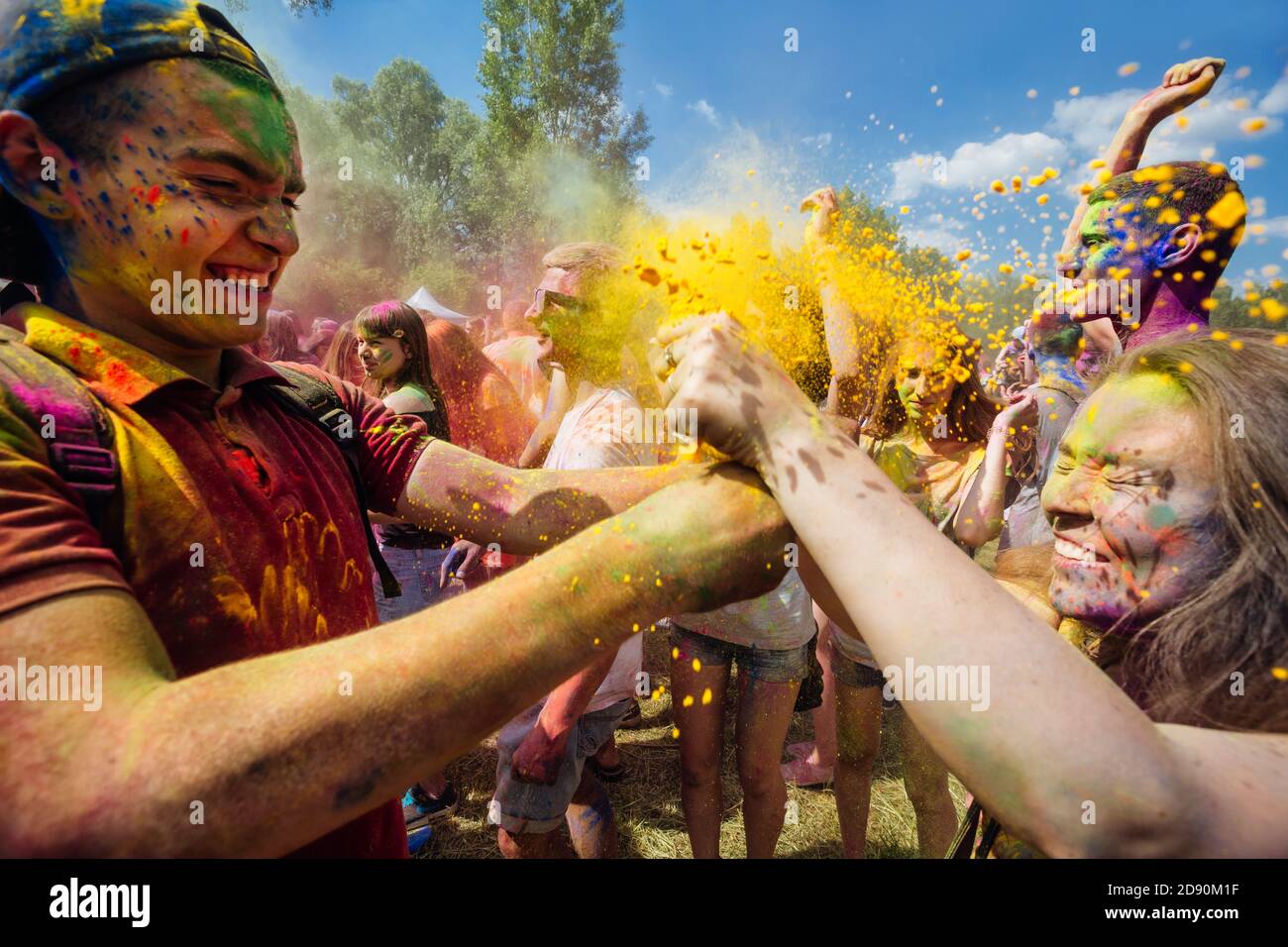 Holi colors holiday. Crazy crowd of young people having fun during ...