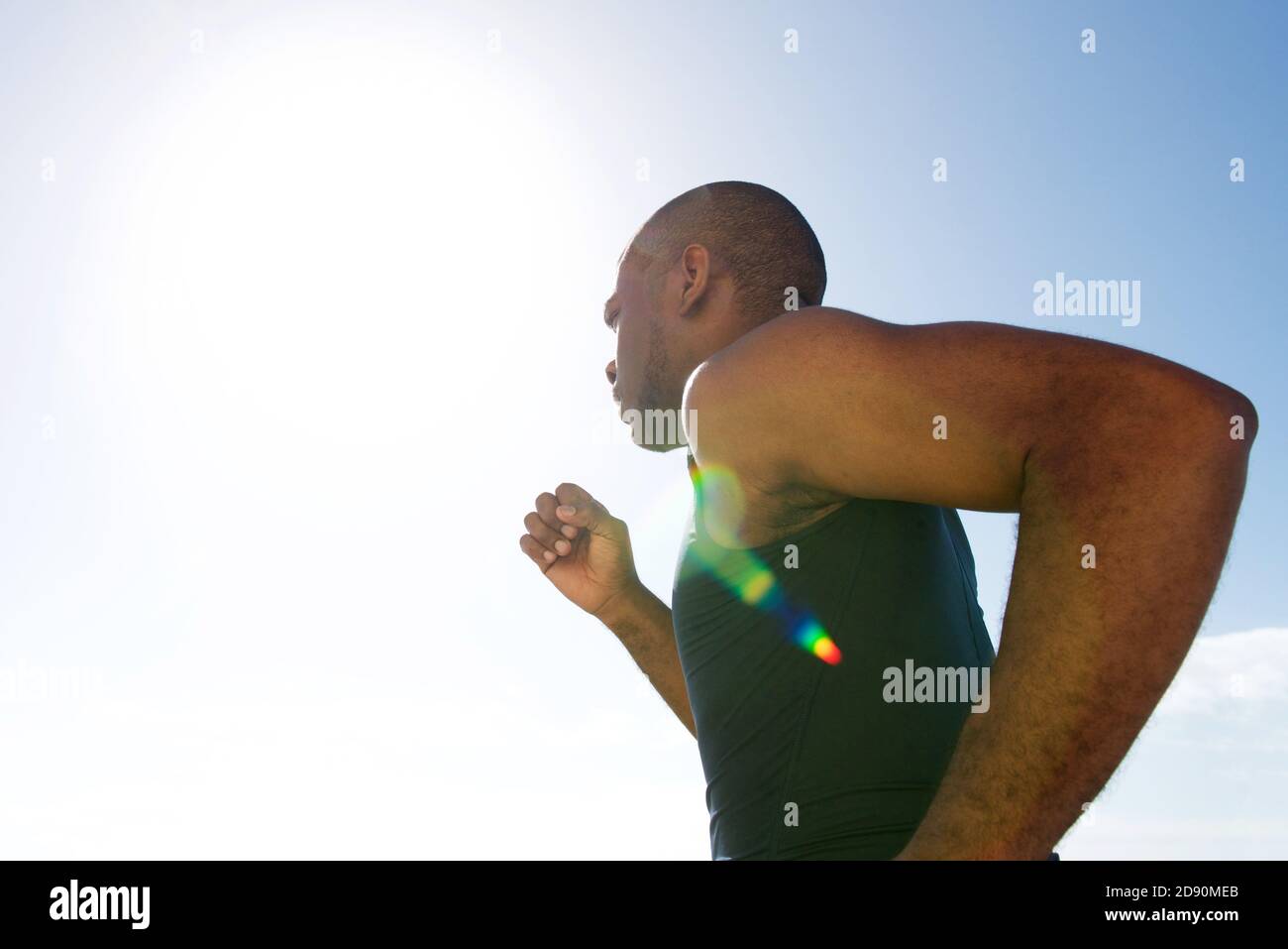Black man running hi-res stock photography and images - Alamy