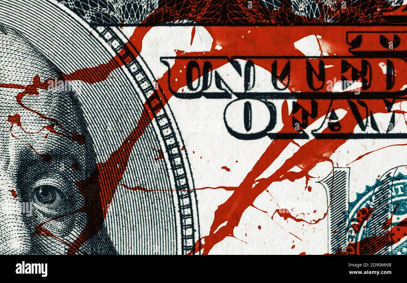 Blood money concept. Fragment of a one hundred dollar bill with blood ...
