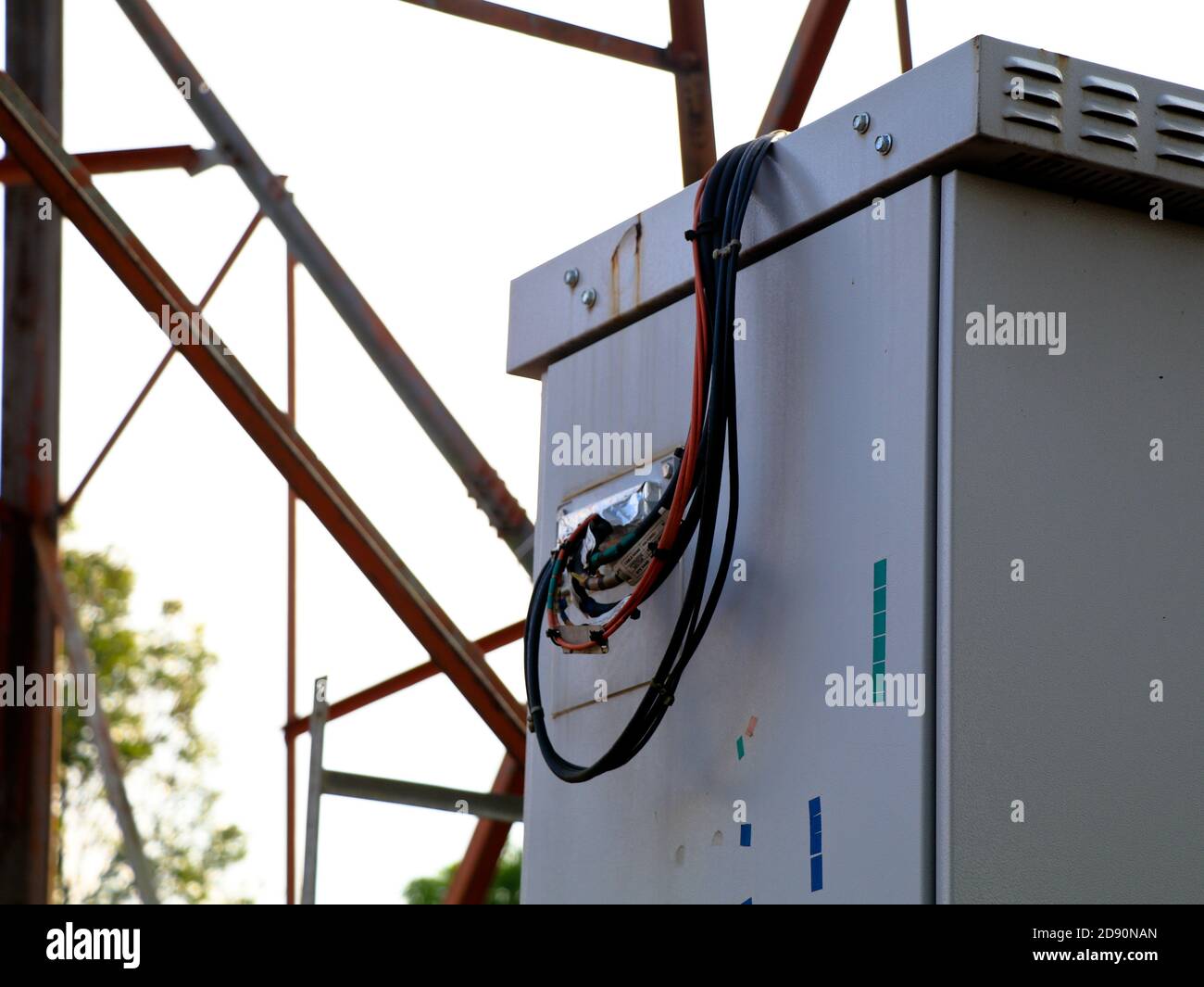 Multiple cables of mobile phone net work, under the tower Stock Photo ...