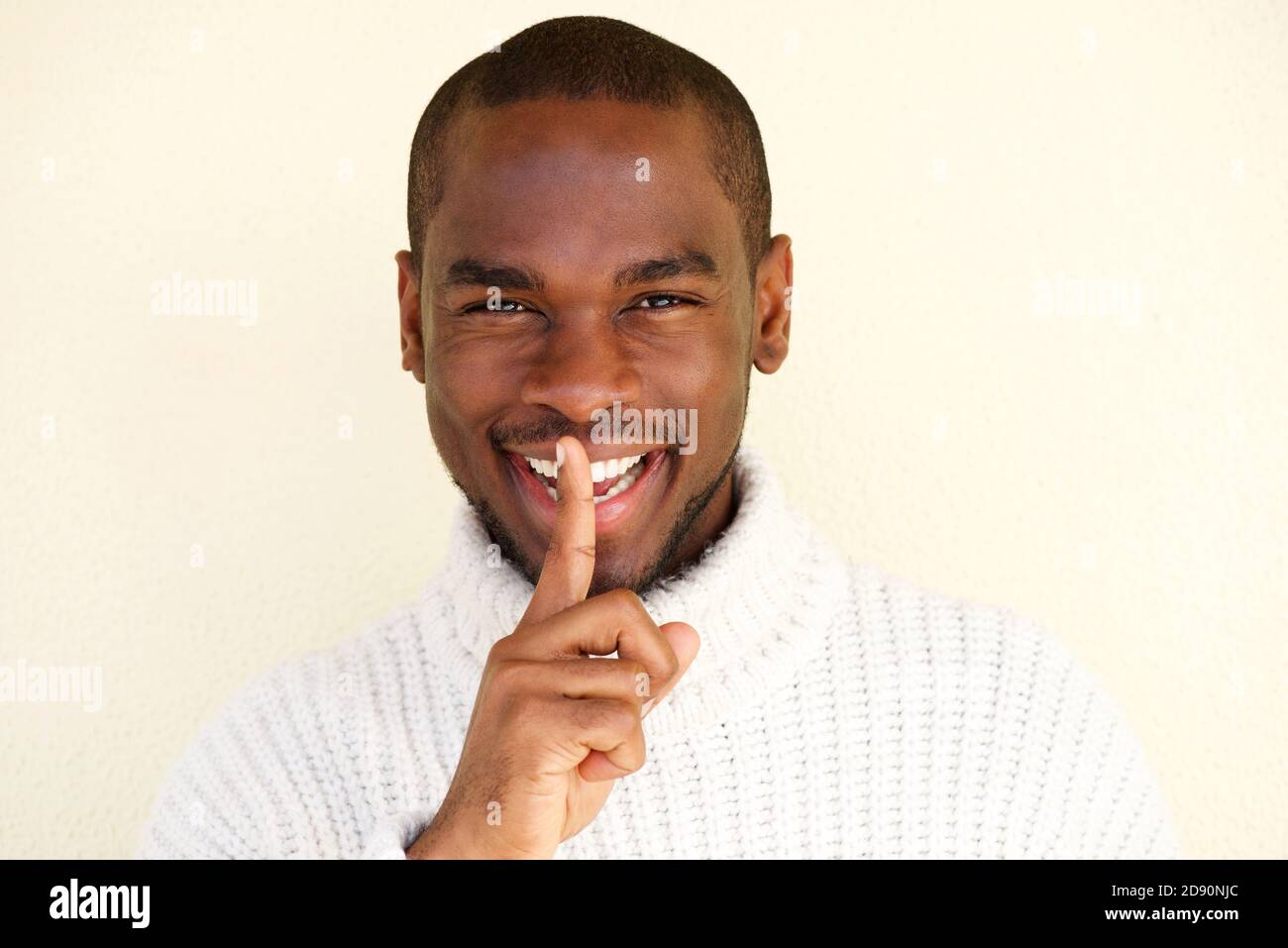 African american looking over wall hi-res stock photography and images ...