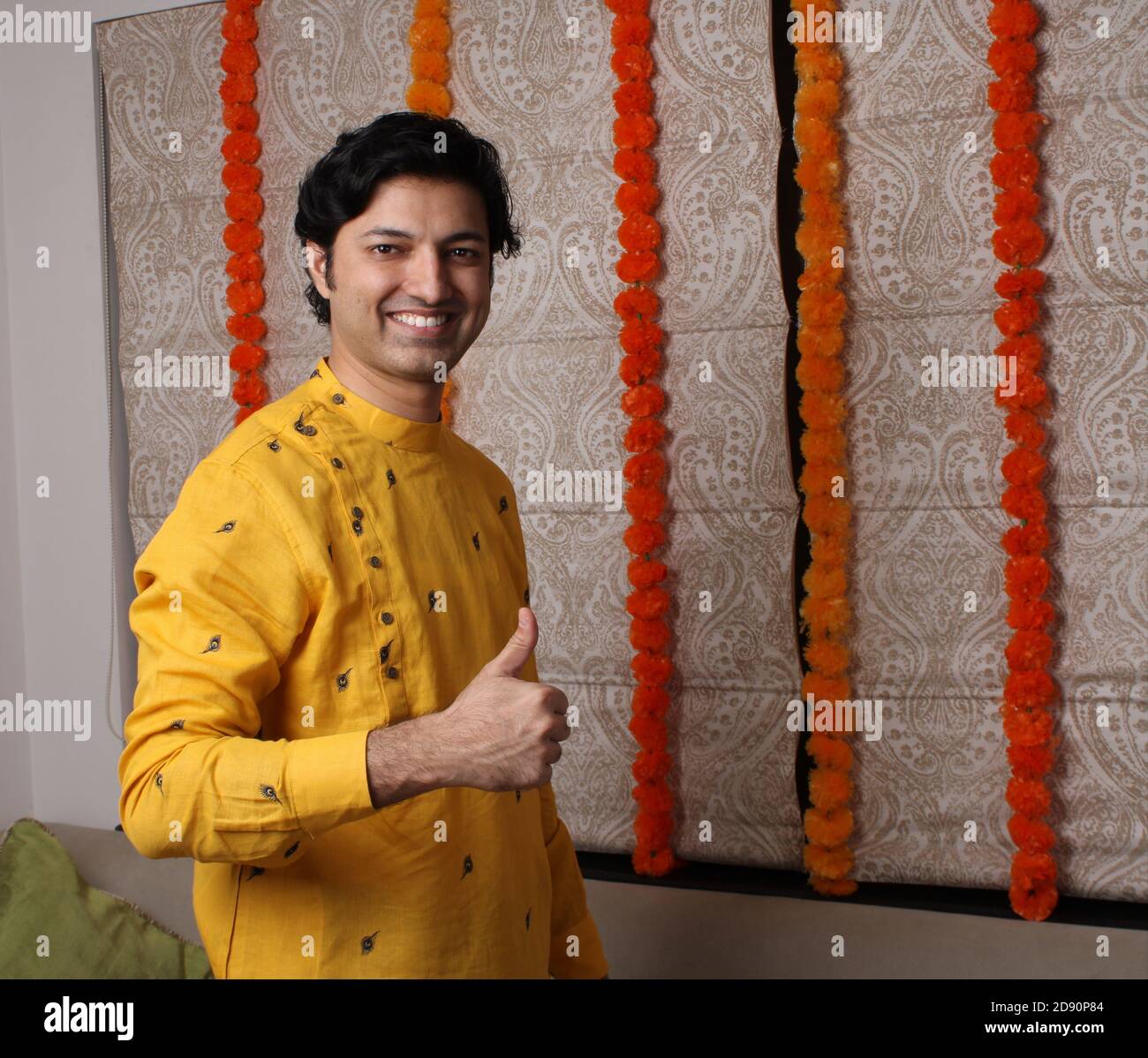 Young happy Indian man wearing traditional holding gift boxes Stock ...
