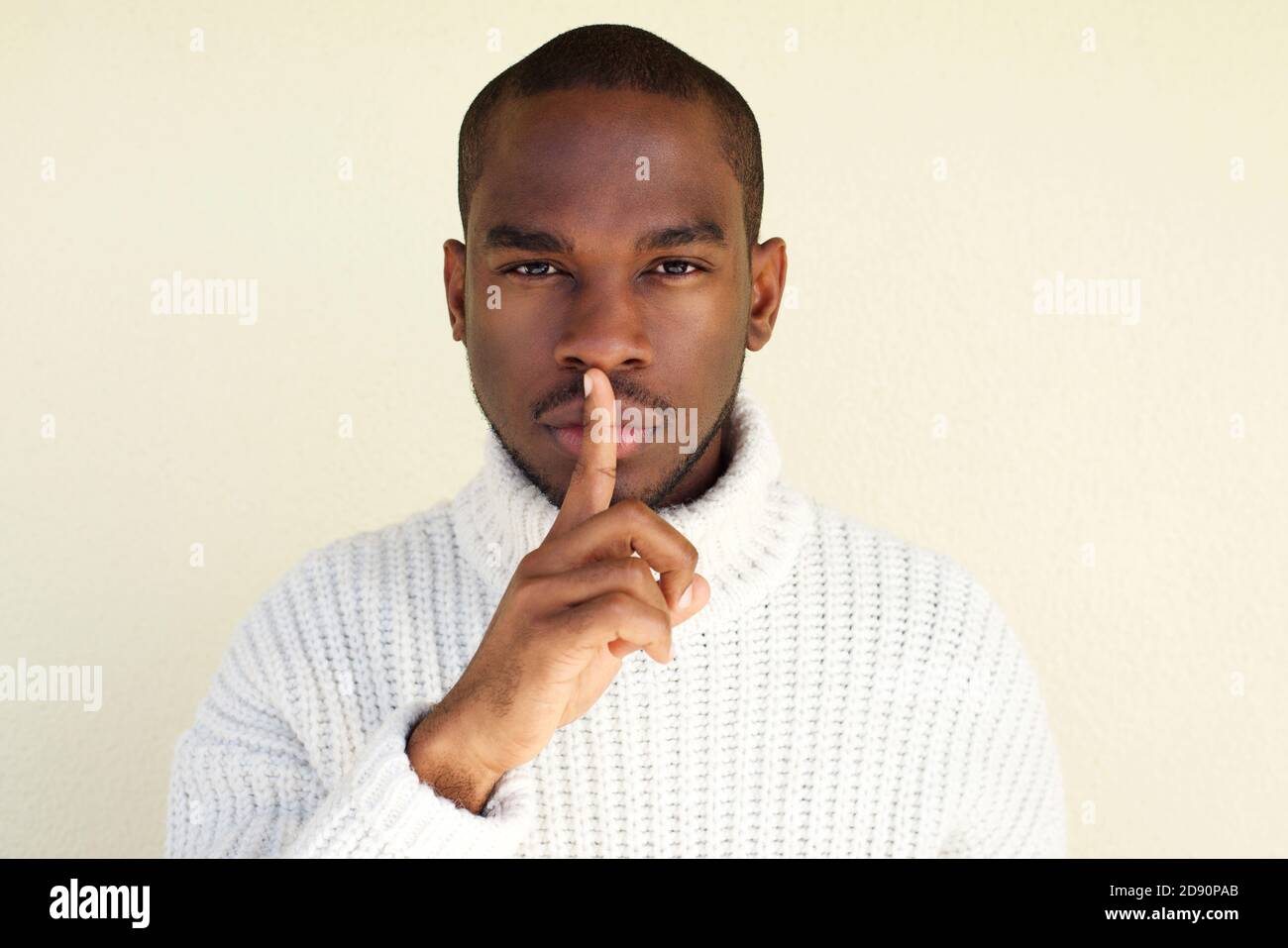 Finger over lip hi-res stock photography and images - Alamy