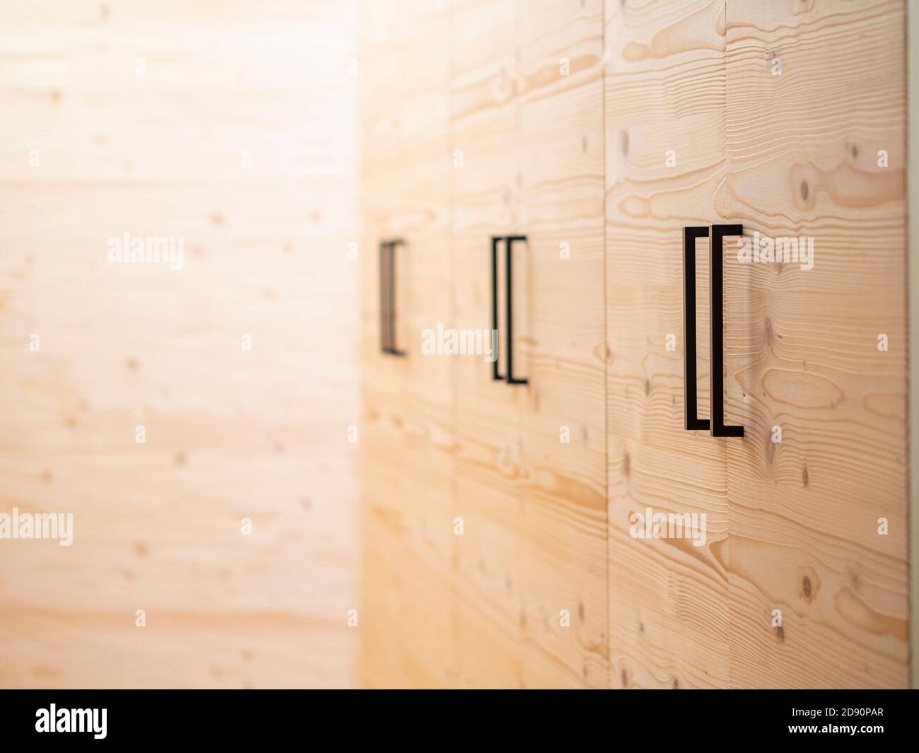 black handles for walk-in closet doors Stock Photo - Alamy