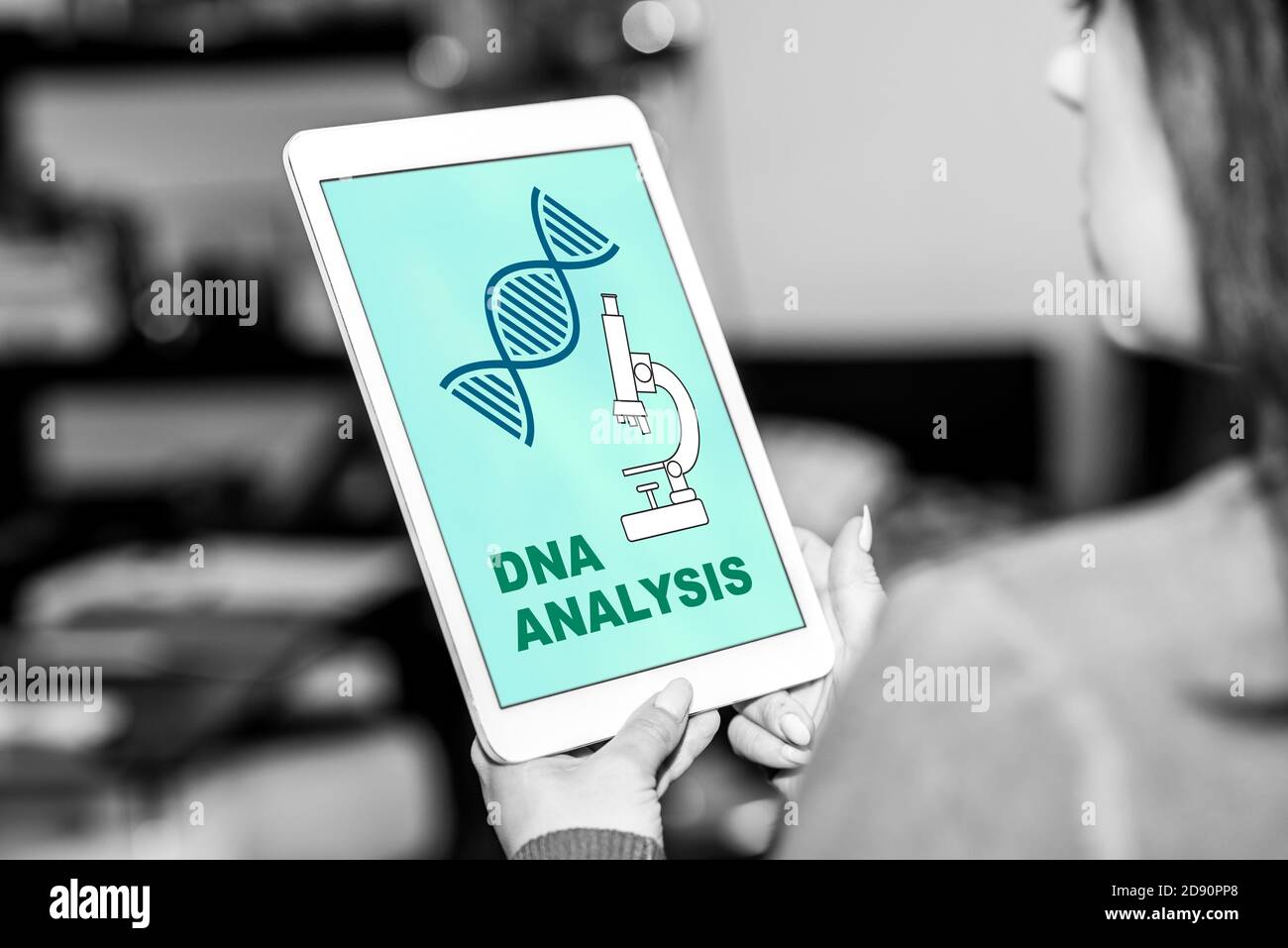 Tablet screen displaying a dna analysis concept Stock Photo - Alamy
