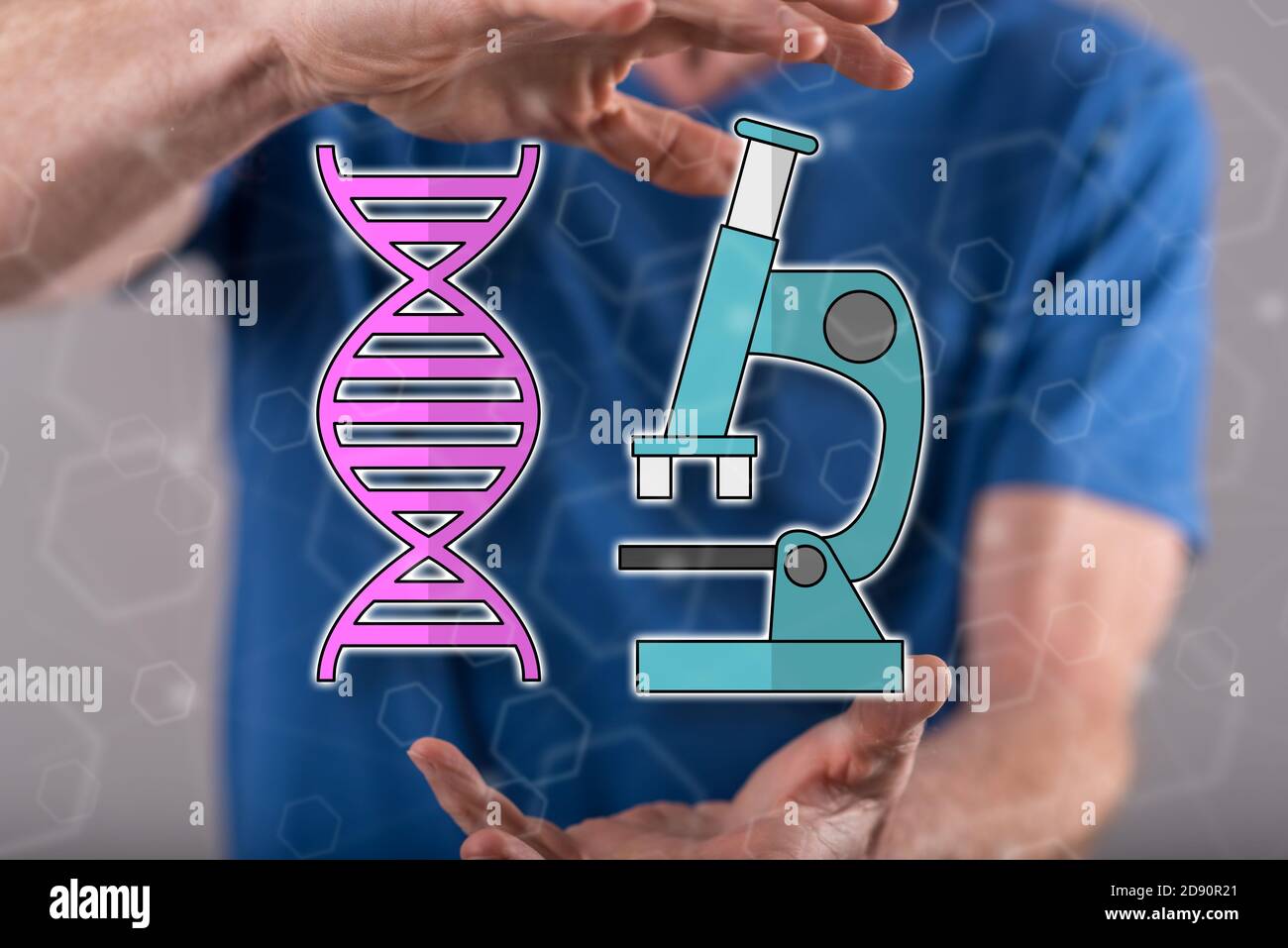 Dna technology concept between hands of a man in background Stock Photo ...