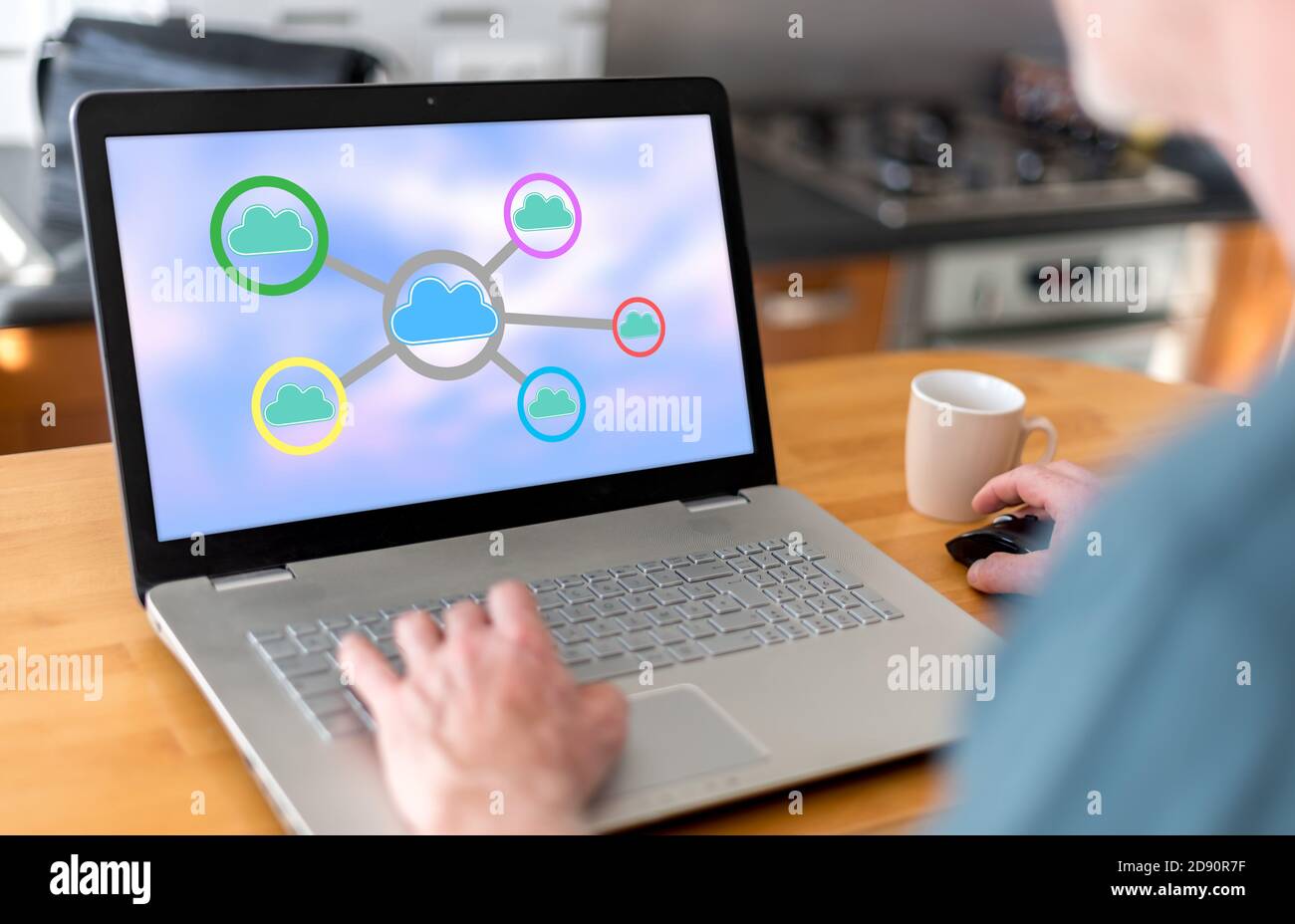 Using laptop connect cloud hi-res stock photography and images - Alamy