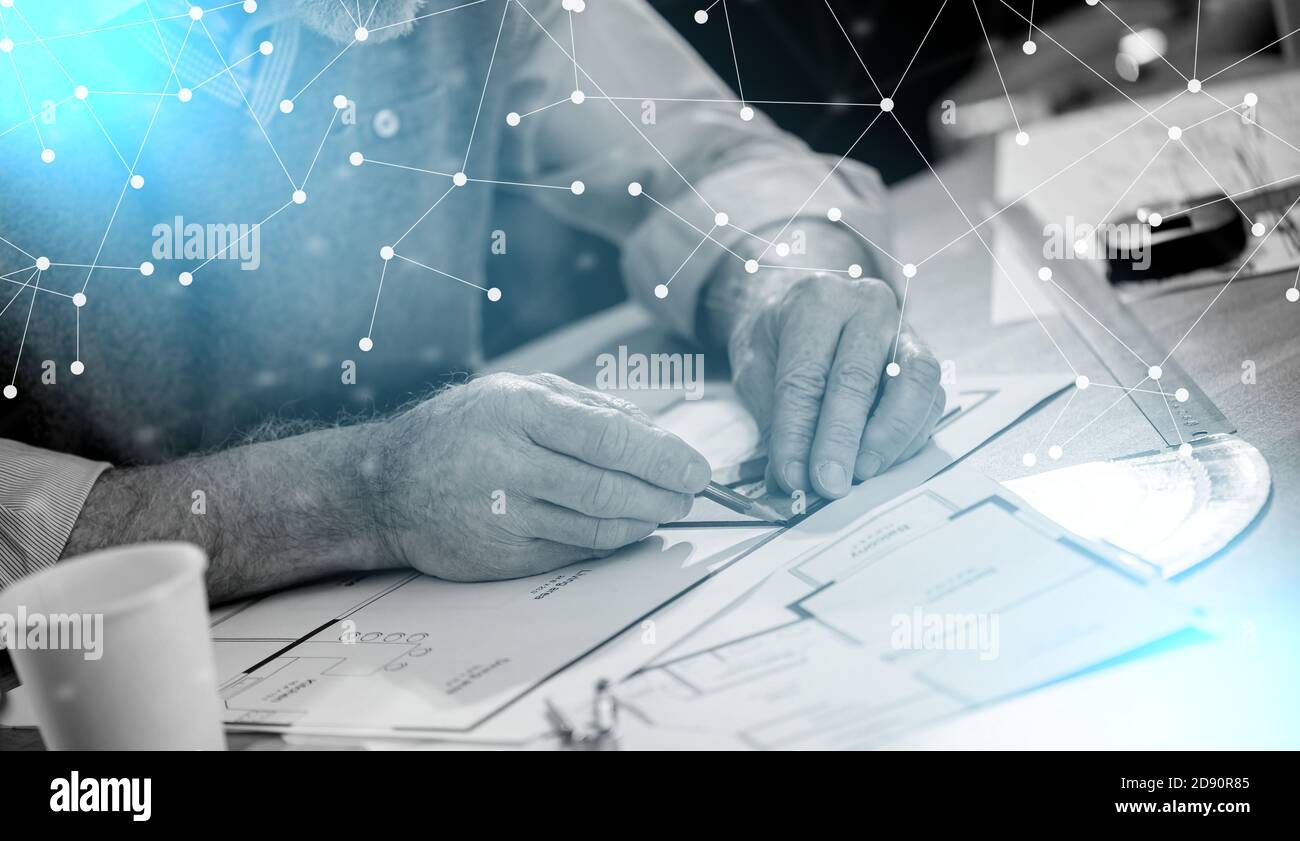 Architect working on a project and using a square; light effect Stock ...