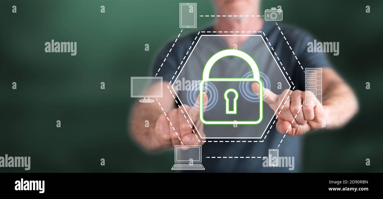 Man touching a devices security concept on a touch screen with his ...