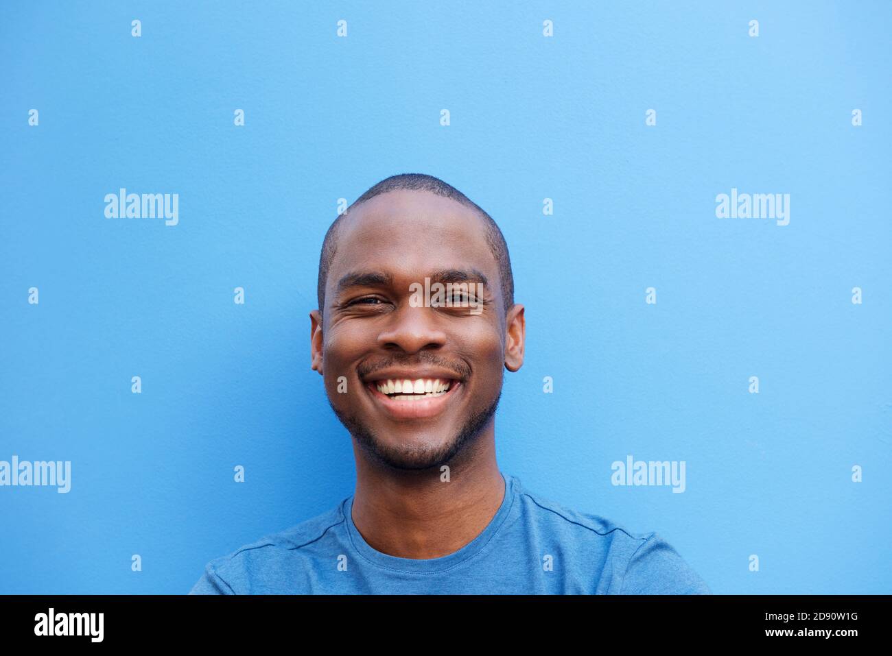 Man against blue background hi-res stock photography and images - Alamy