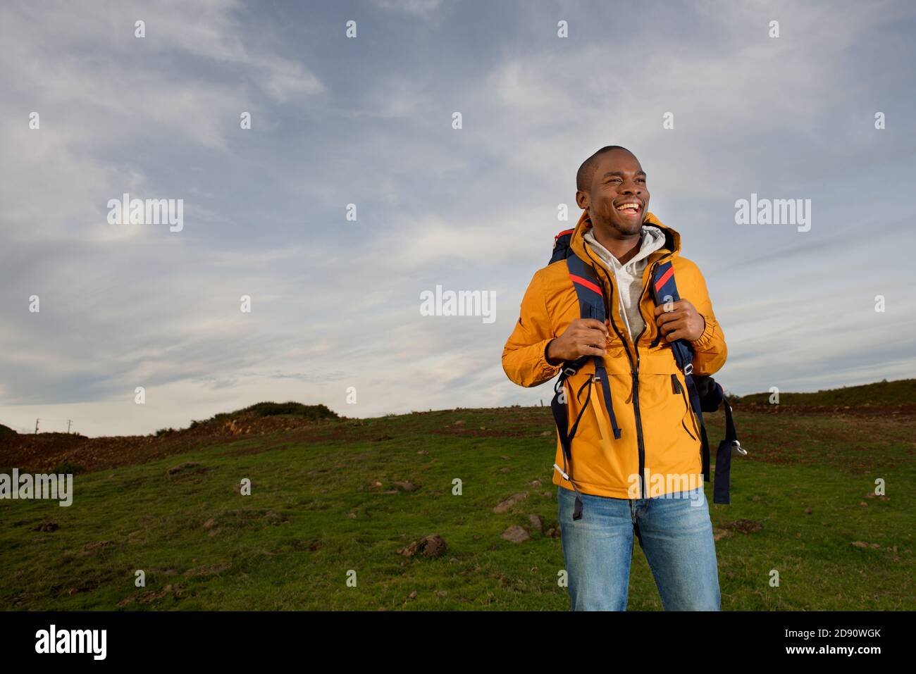 Man backpack walk away hi-res stock photography and images - Alamy