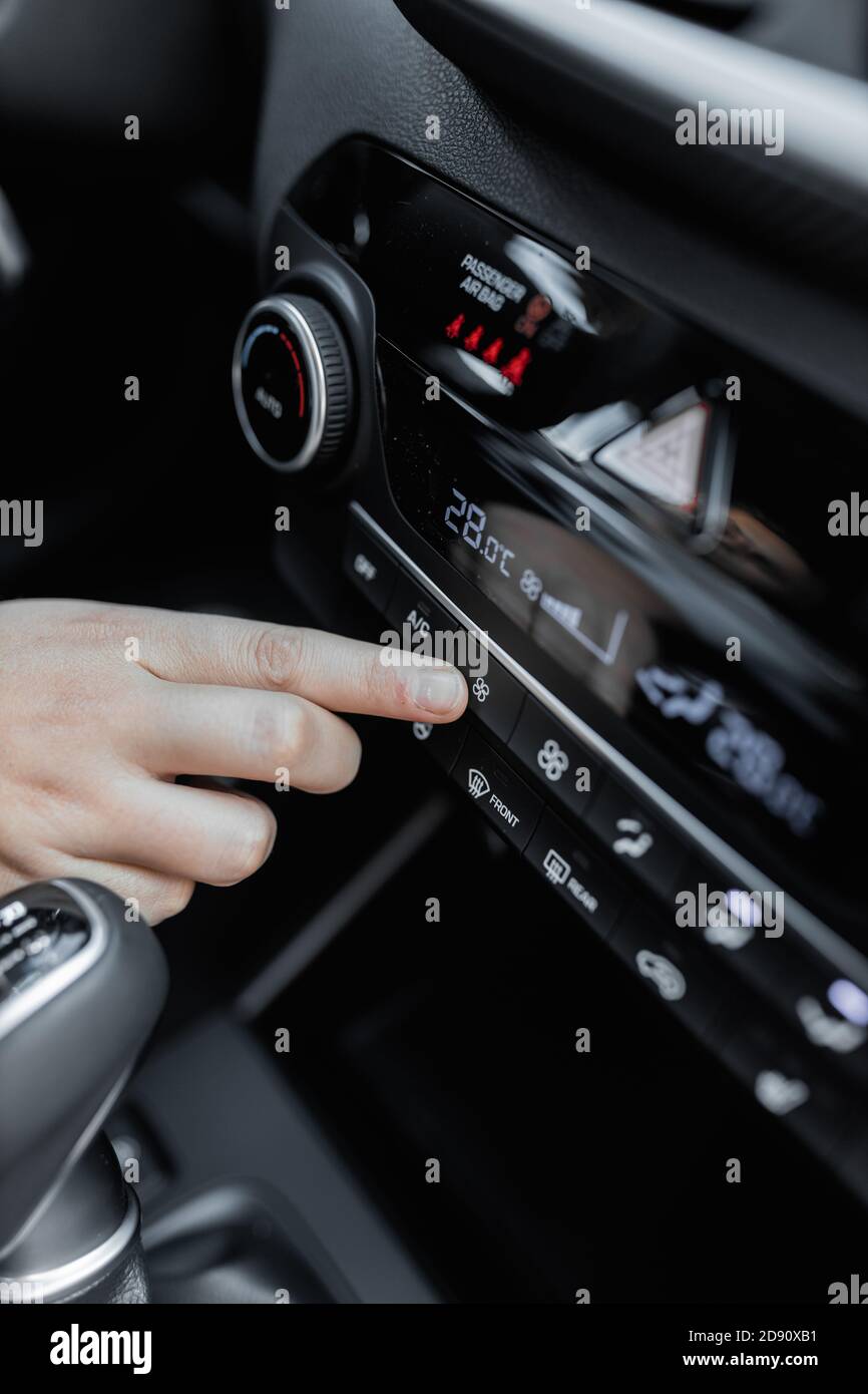 Interior view of a new car. Climate or air conditioner system adjusted ...