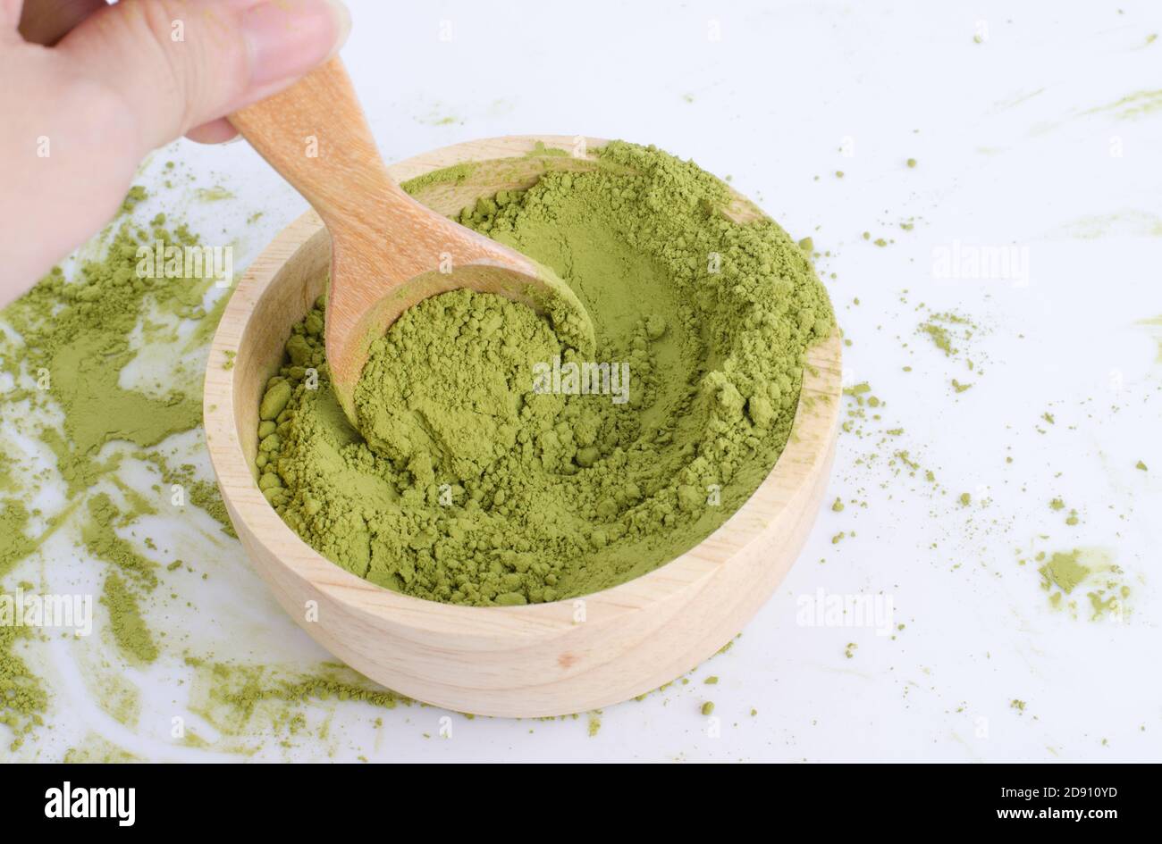 green powder isolated on white background Stock Photo - Alamy