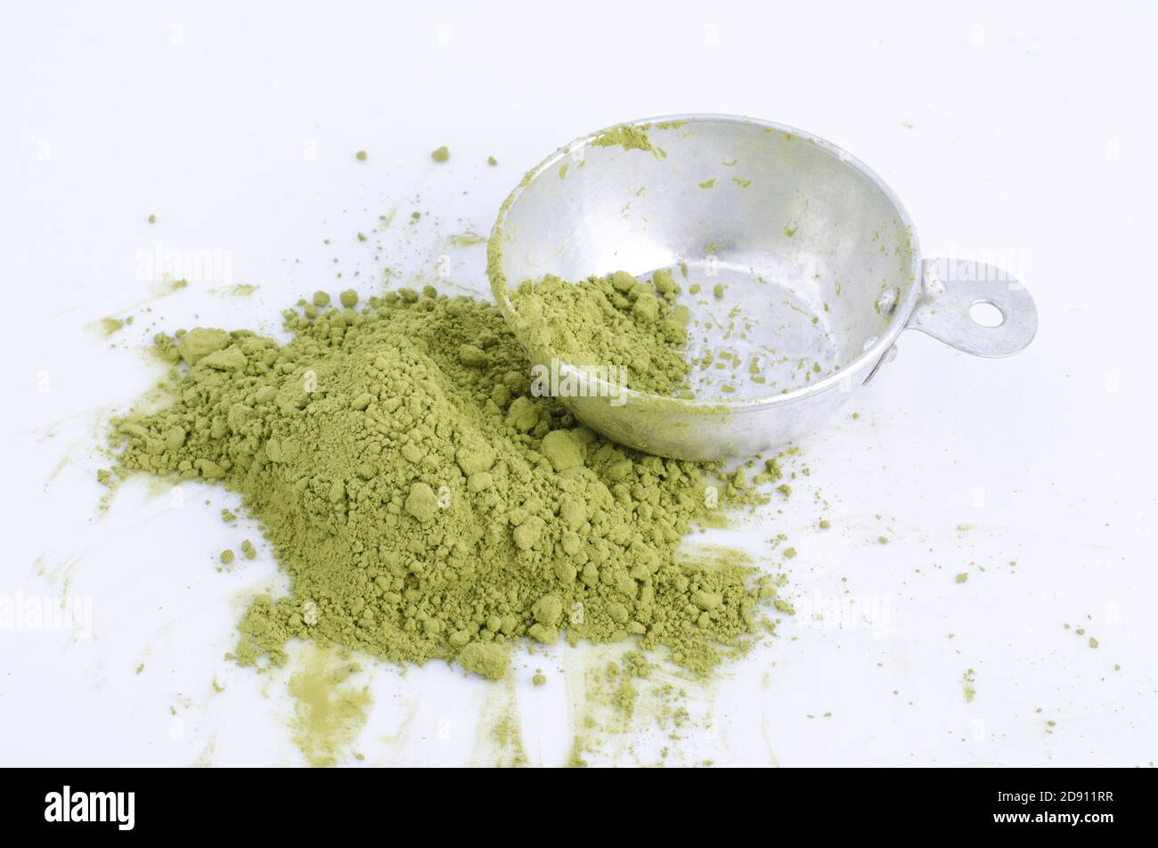 green powder isolated on white background Stock Photo - Alamy