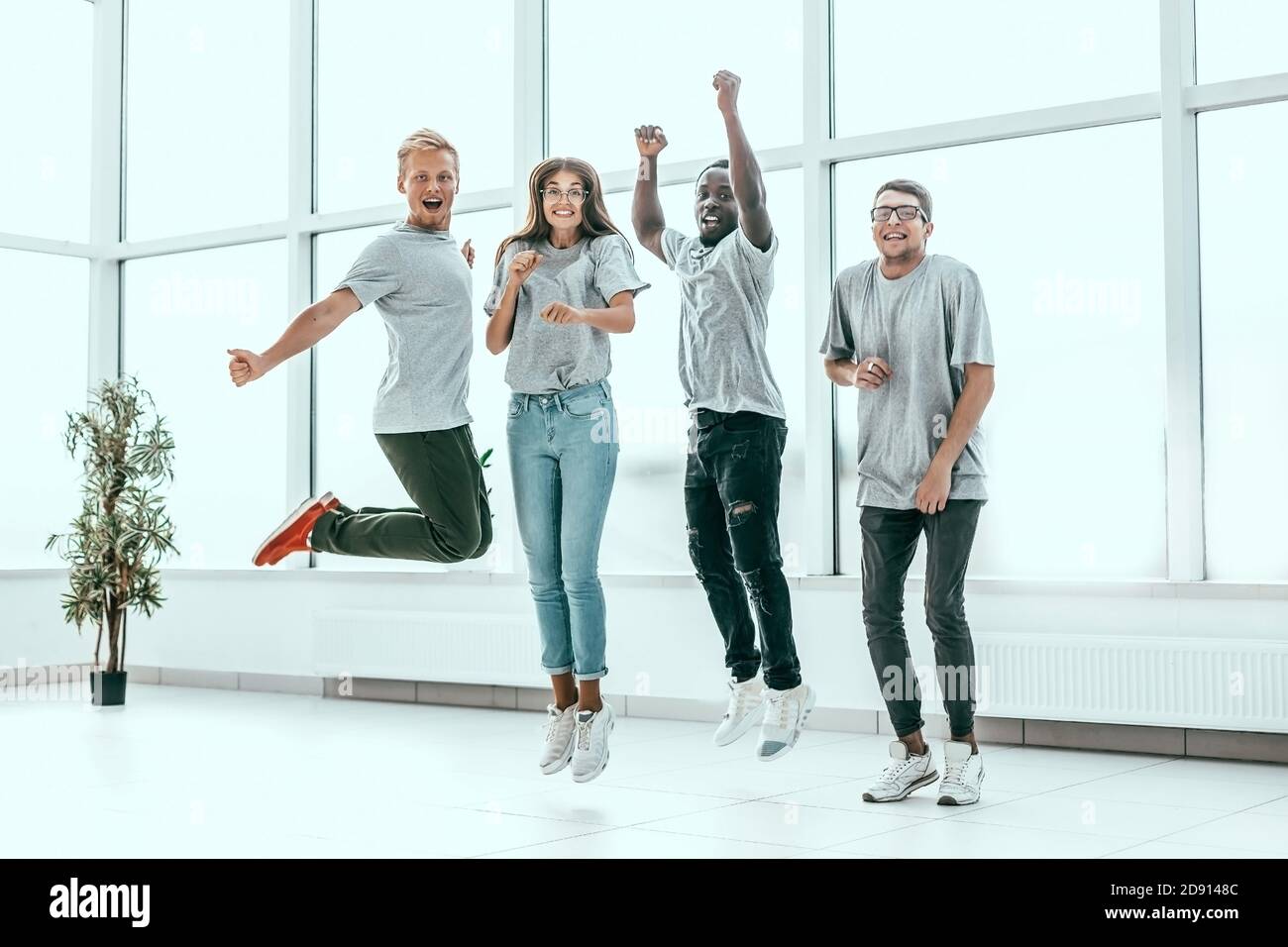 happy young employees are having fun in the new office Stock Photo - Alamy