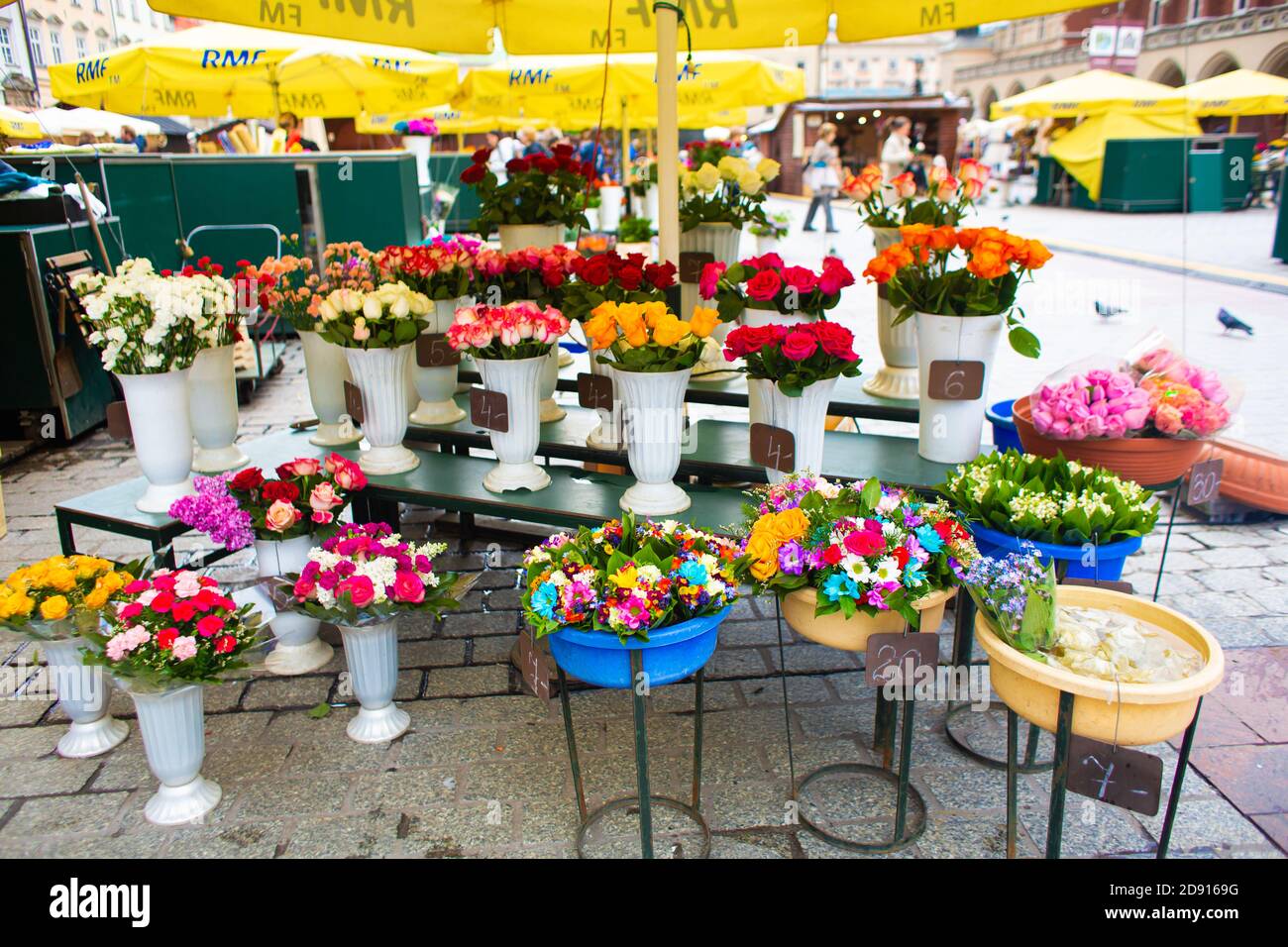 Street flower shop. Flowers in vases on the street Stock Photo - Alamy