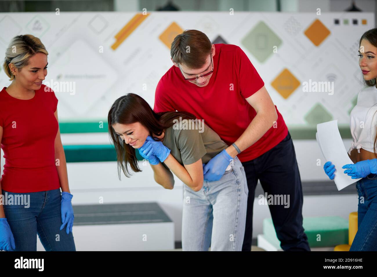 professional caucasian man instructor showing how to safe a life when ...